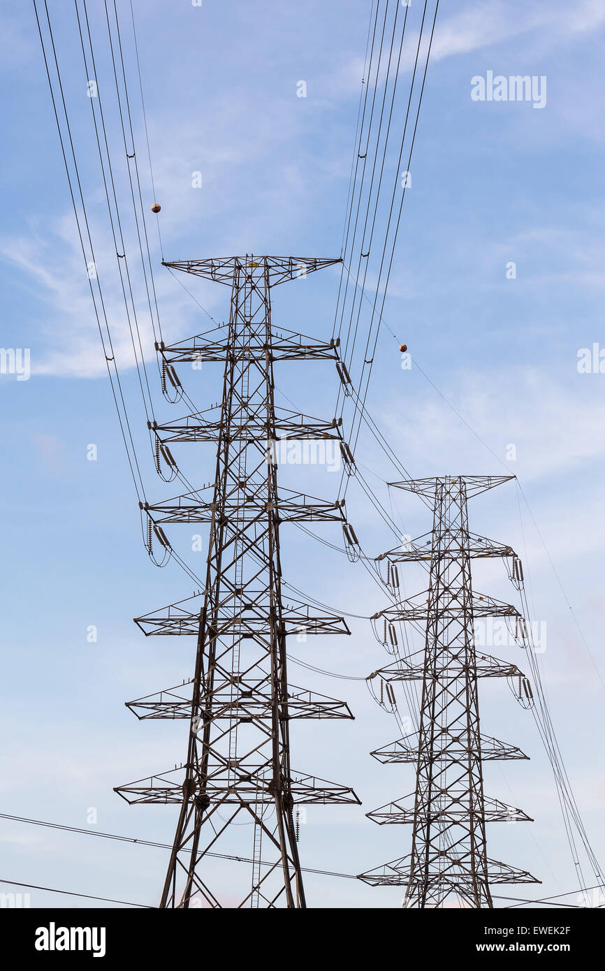 The transmission tower on blue sky background Stock Photo - Alamy