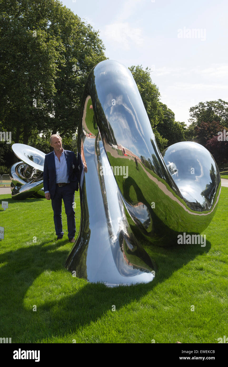 Sculptor Richard Hudson poses with his sculptures Adam & Eve outside ...