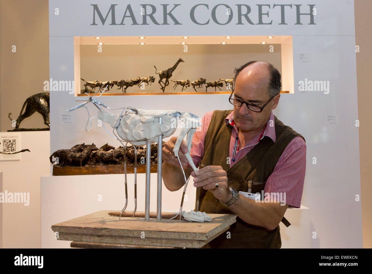 Sculptor Mark Coreth at work on the stand of Sladmore Contemporary ...