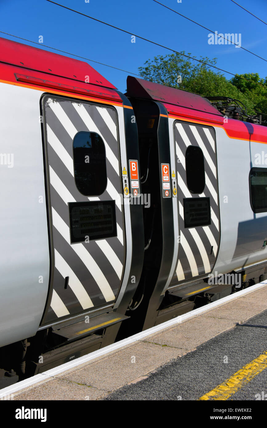 Sliding doors. Virgin Class 390 Pendolino passenger train Stock Photo ...