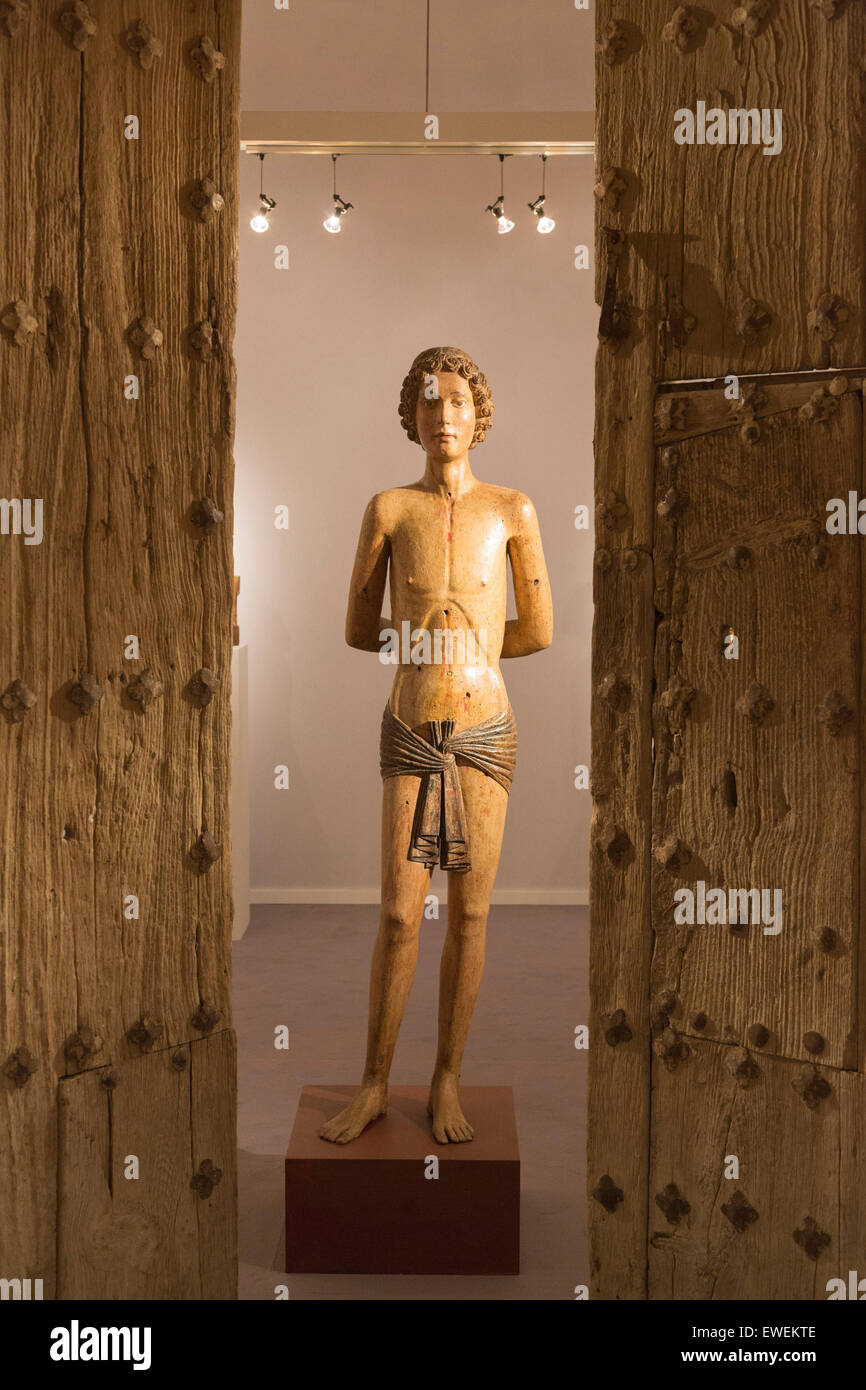 A 14th century wooden statue from Saint Sebastian and wooden doors from ...