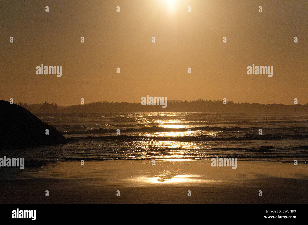 Golden sunset along Long Beach, Vancouver Island, British Columbia ...