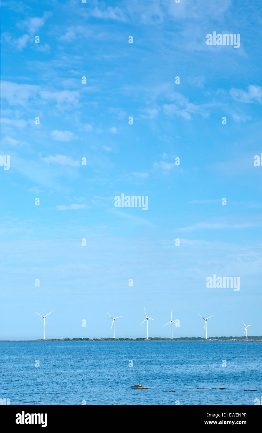 Seaside wind power turbines in ocean and sky landscape in Halland ...