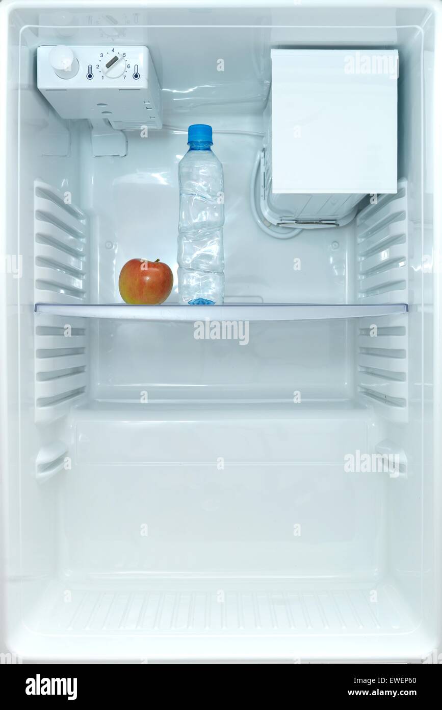 A shot of an open bar fridge Stock Photo - Alamy
