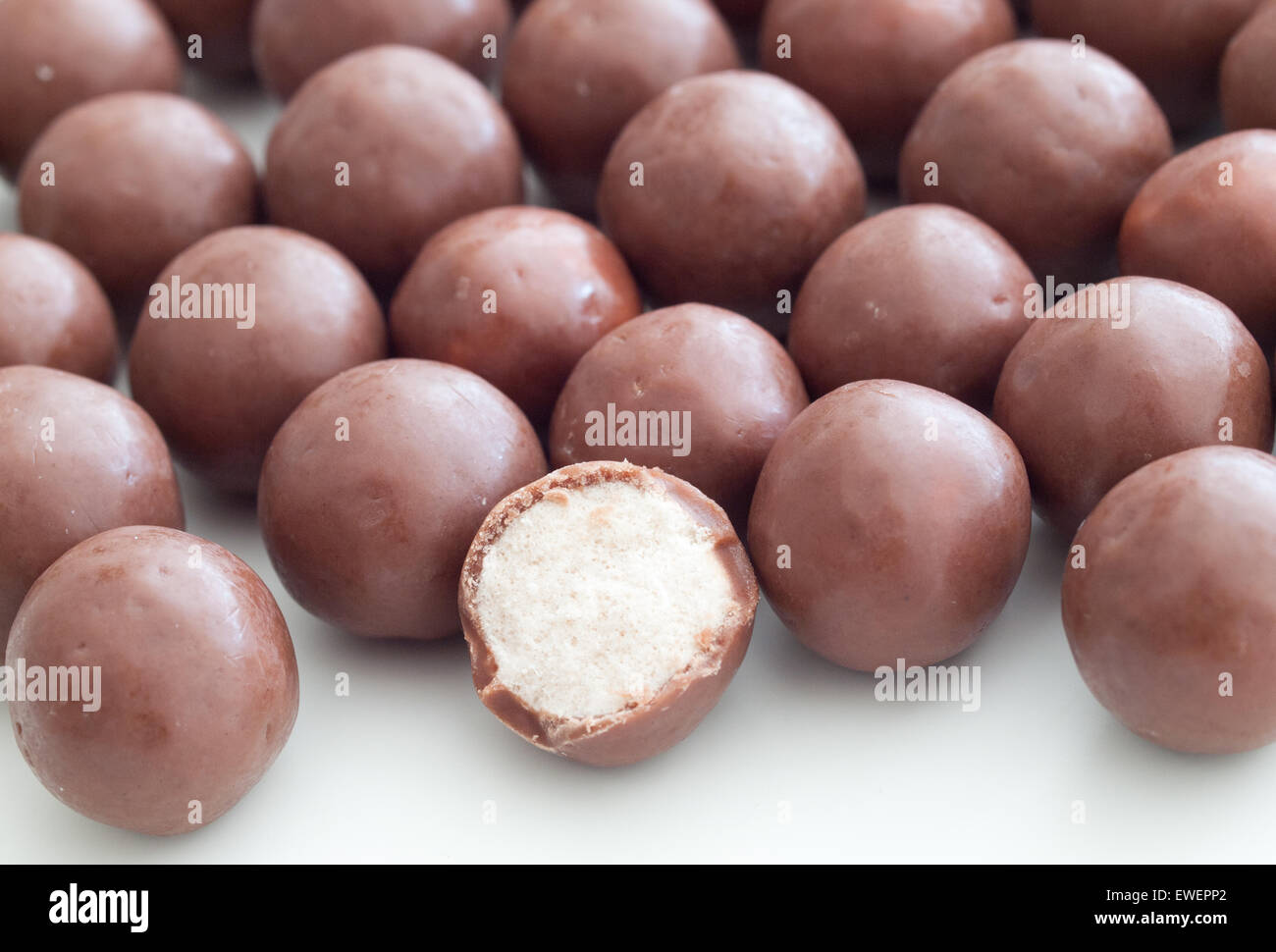 A close-up of Whoppers candy. Whoppers are malted milk balls covered ...