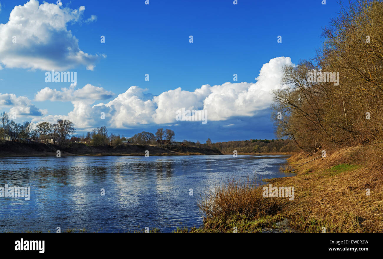 Spring river landscape with dry grass Stock Photo - Alamy