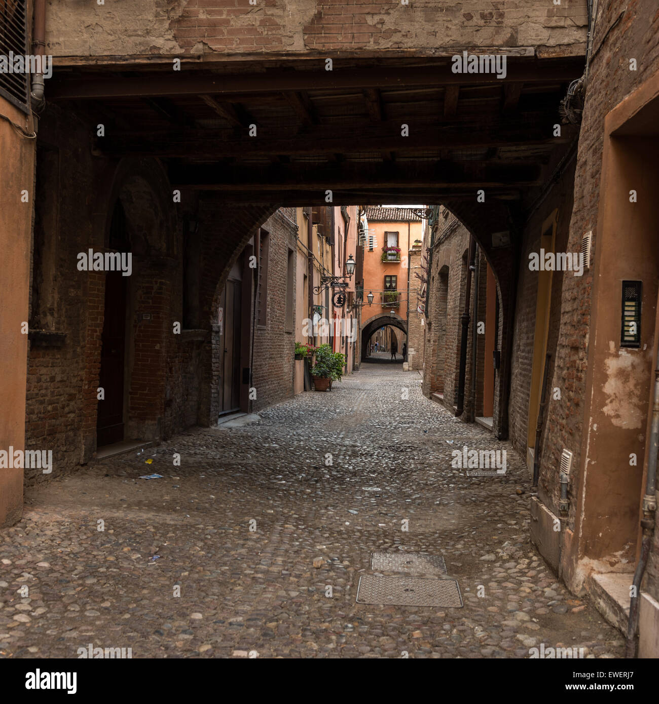 Ancient medieval street in the downtown of Ferrara city Stock Photo - Alamy