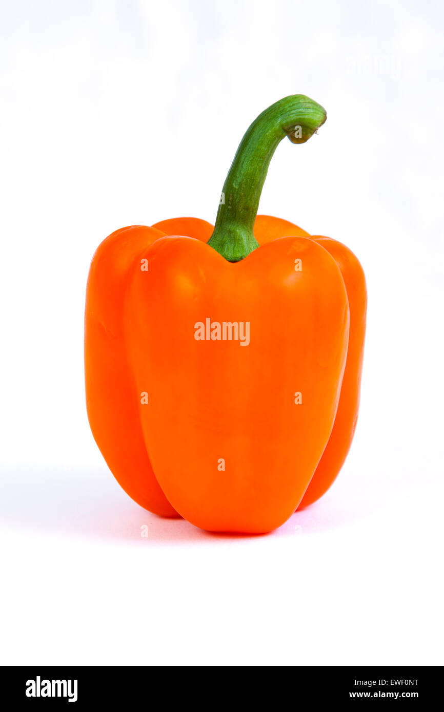 Orange Pepper Against White Background with Space for Editorial Stock ...