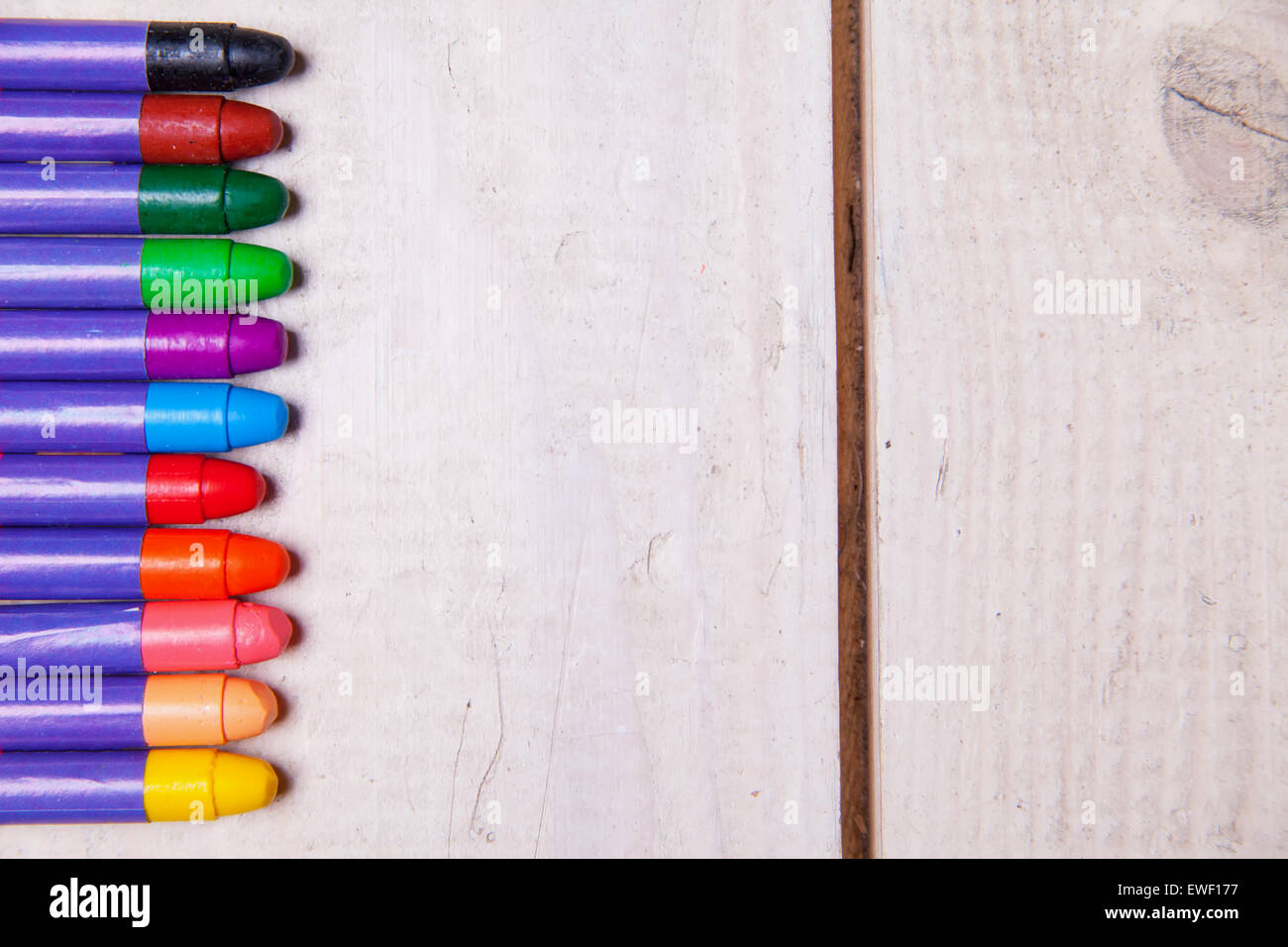 wax crayons on wood table Stock Photo - Alamy