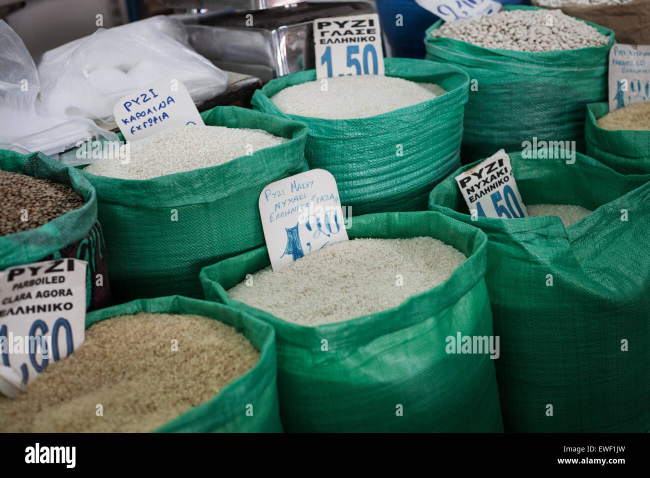 Sacks of rice and pulses in a shop at the central market of Athens ...