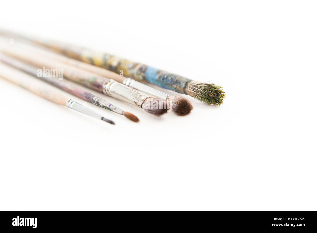 Dirty used paintbrushes Stock Photo - Alamy
