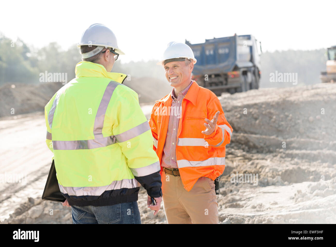 Talking construction hi-res stock photography and images - Alamy