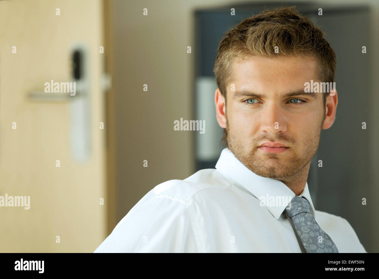 portrait of young confident caucasian businessman Stock Photo - Alamy