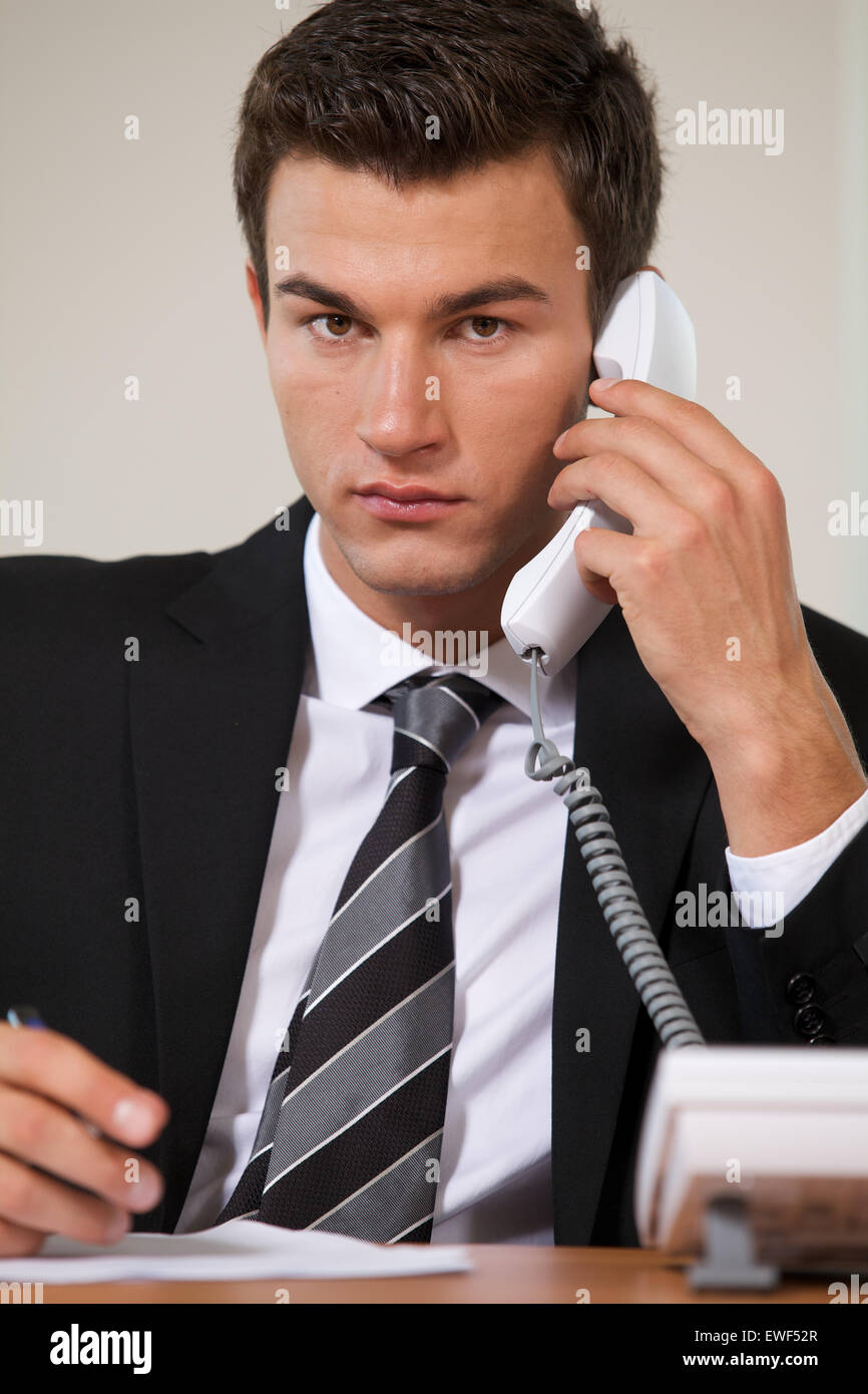 Man landline phone hi-res stock photography and images - Alamy
