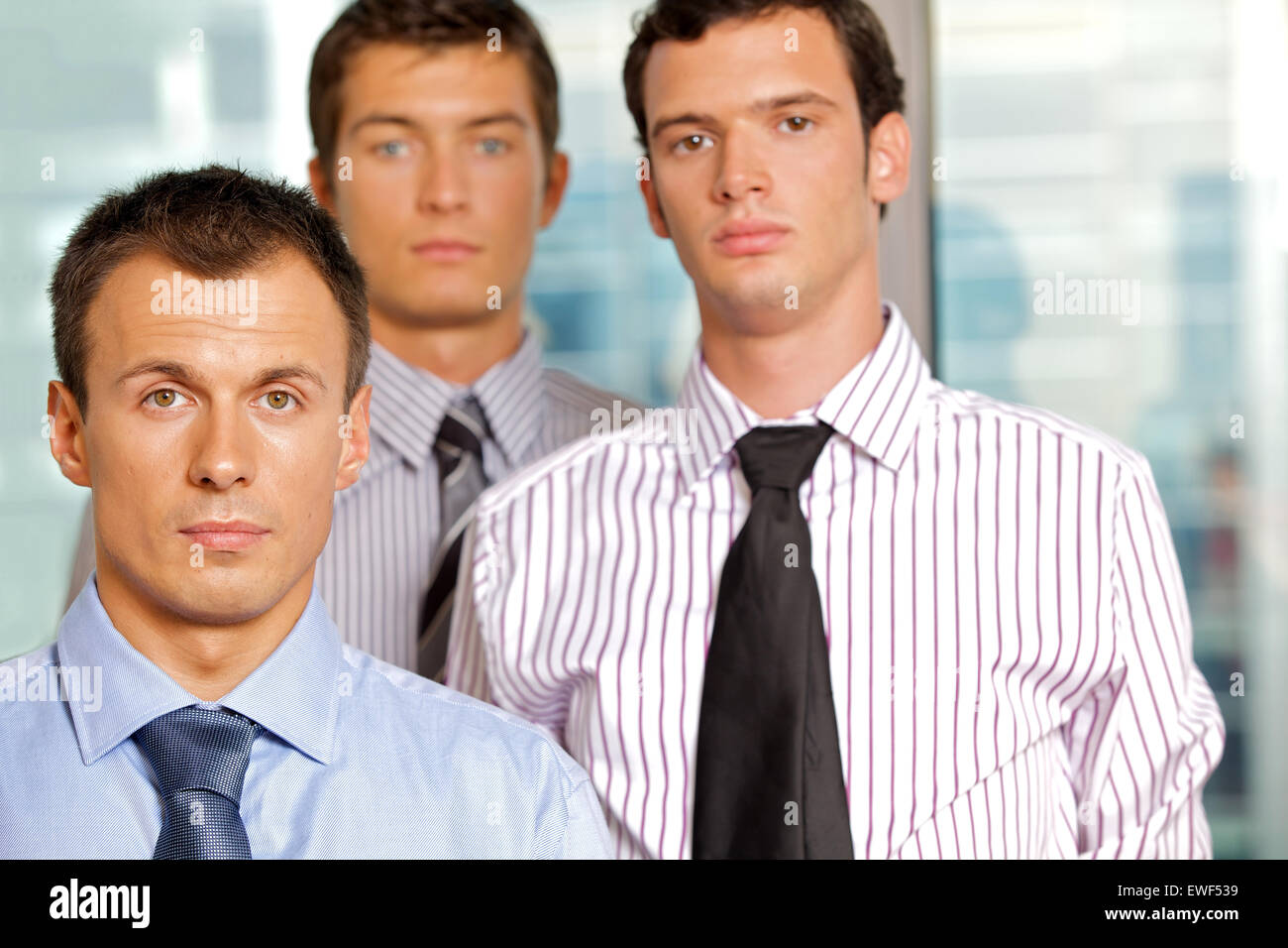 Three businessmen at office, portrait Stock Photo - Alamy