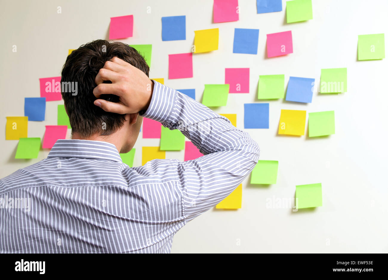 Black businessman behind wall hi-res stock photography and images - Alamy