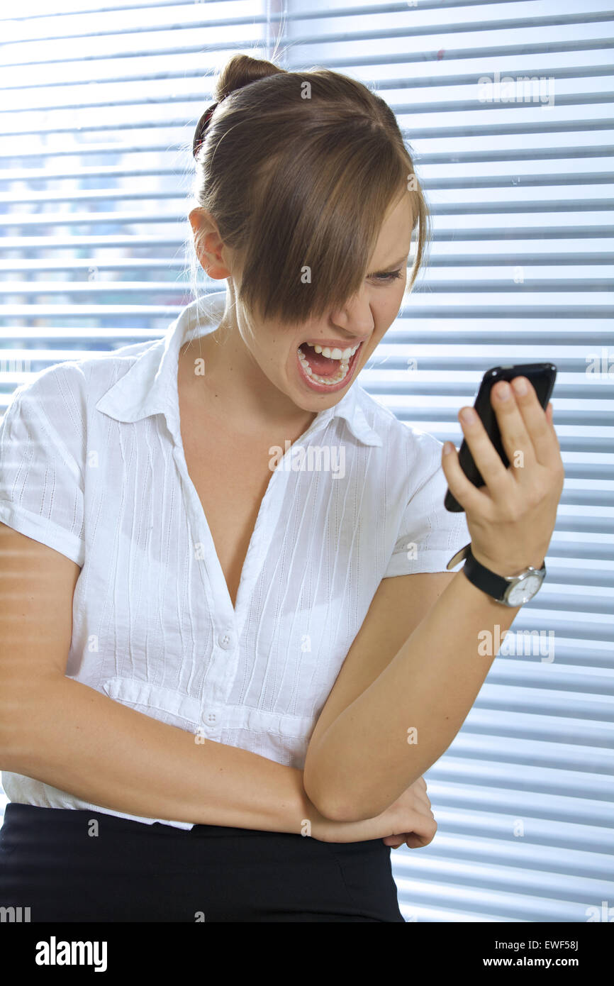 Angry woman phone hi-res stock photography and images - Alamy