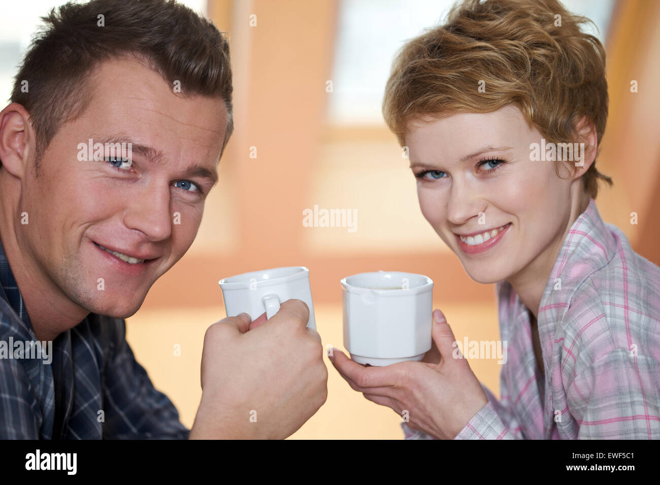 Couple drinking coffee Stock Photo - Alamy