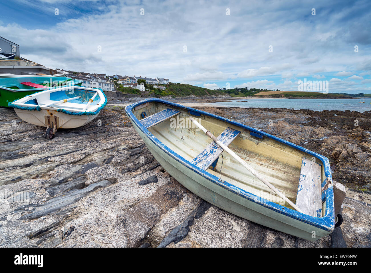 Small rowing boats lined up on the slipway at Portscatho on the ...