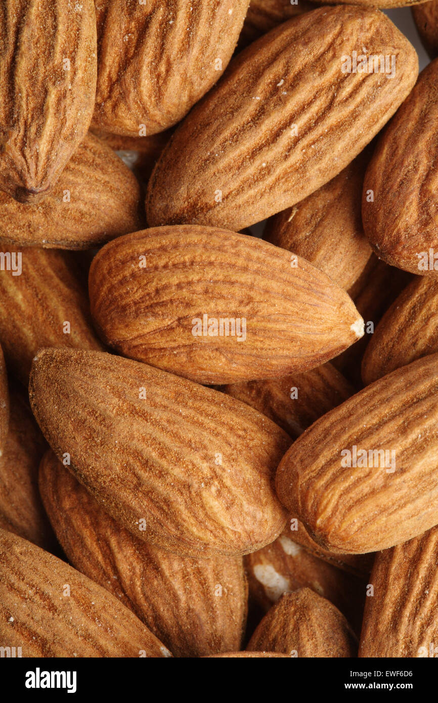 Almonds on white background - close-up Stock Photo - Alamy