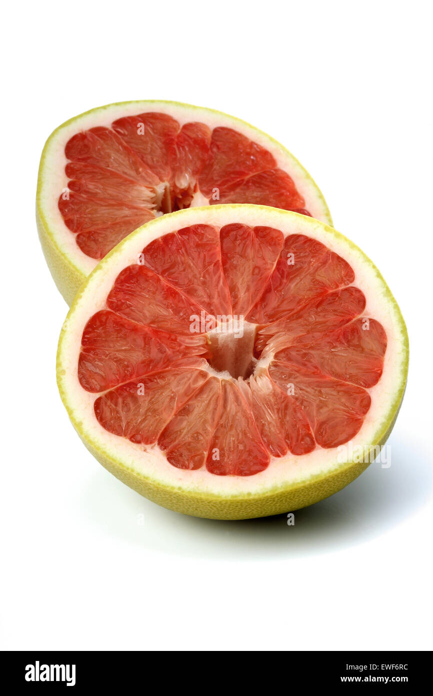Halved grapefruit on white background Stock Photo - Alamy