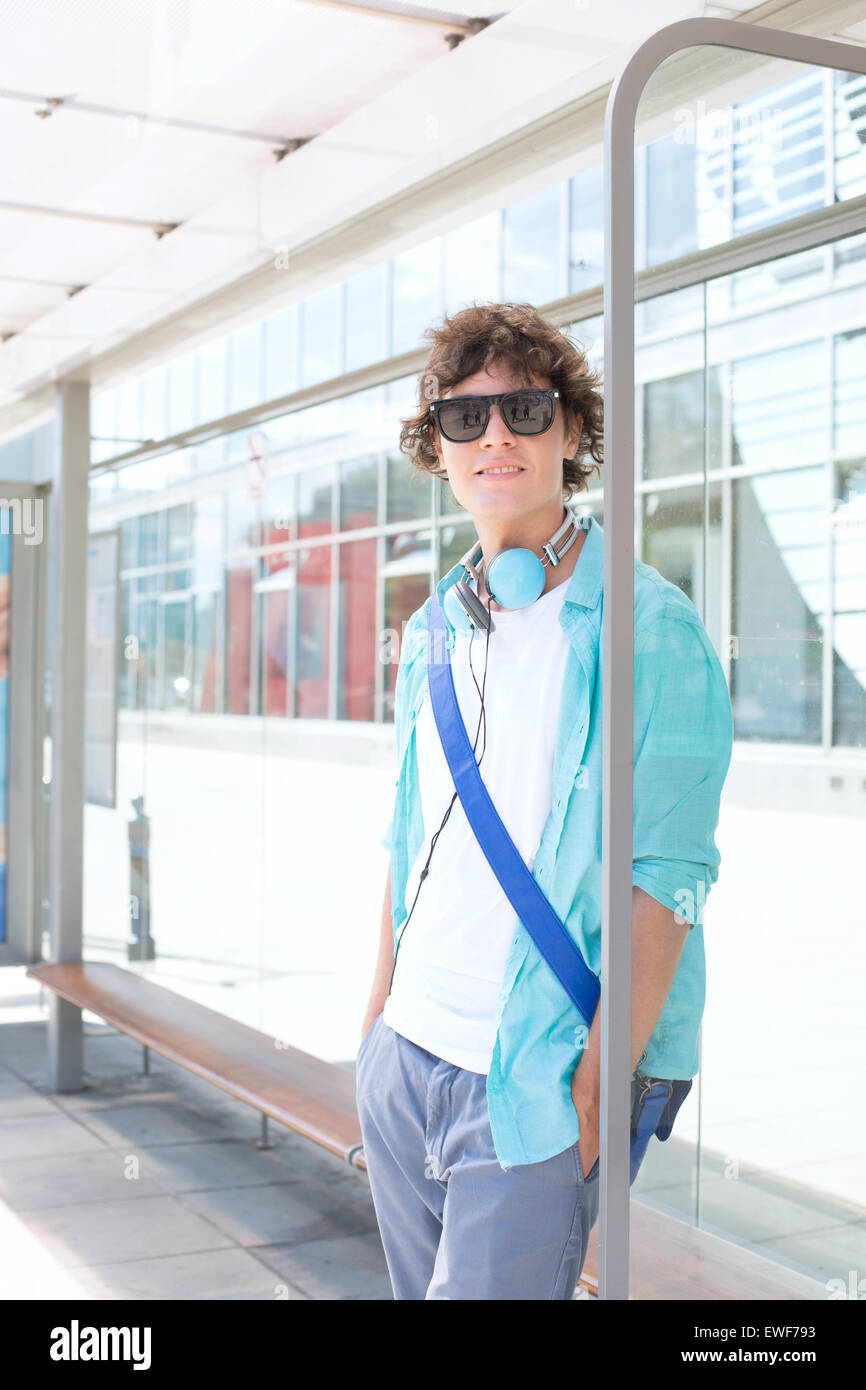 Man at bus stop hi-res stock photography and images - Alamy