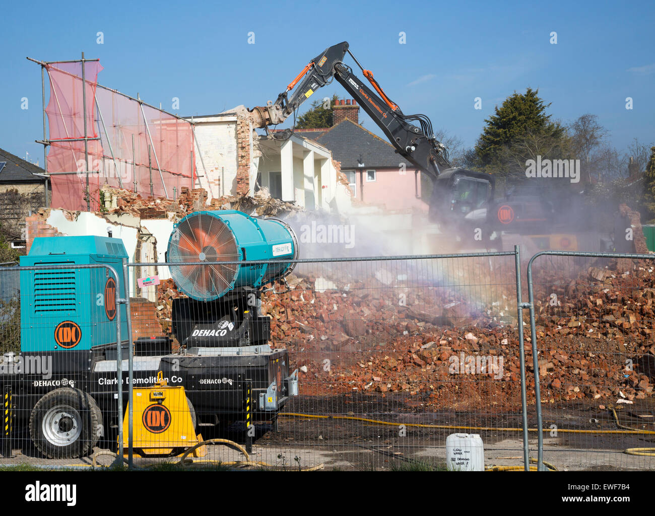 Dehaco water cannon sprayer dampening dust at a demolition site ...