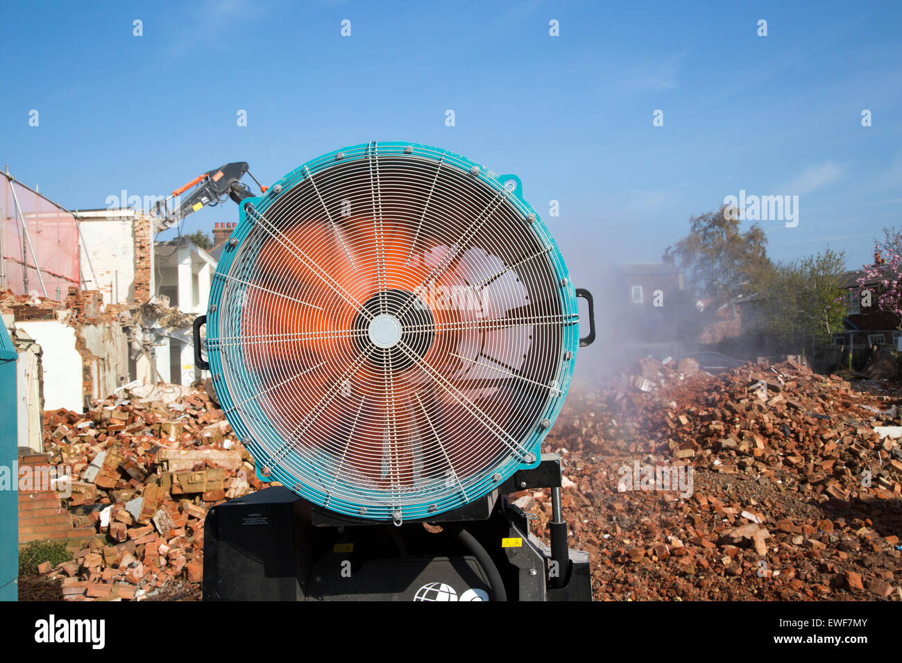 Dehaco water cannon sprayer dampening dust at a demolition site ...