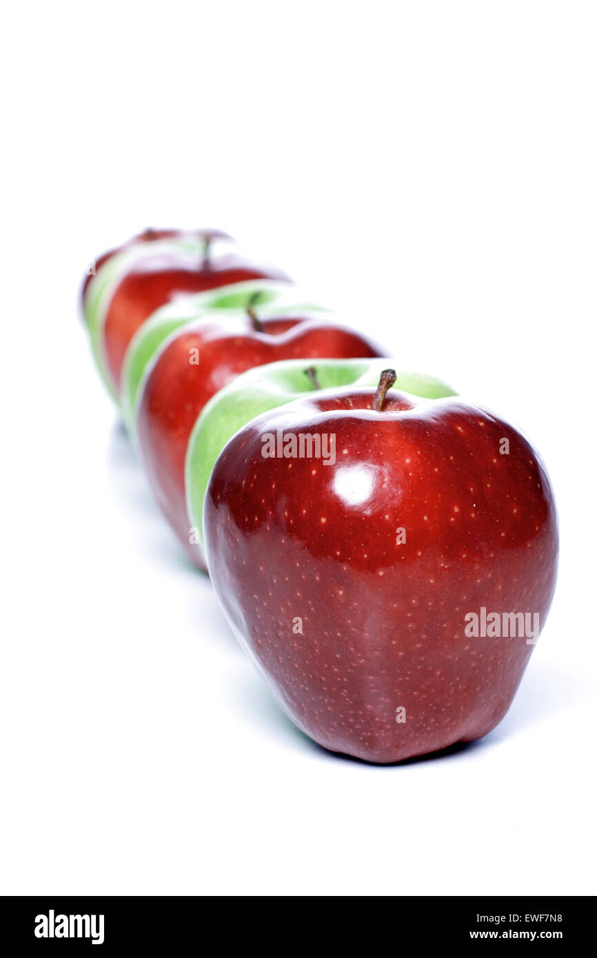 Close-up of apples in row on white background Stock Photo - Alamy
