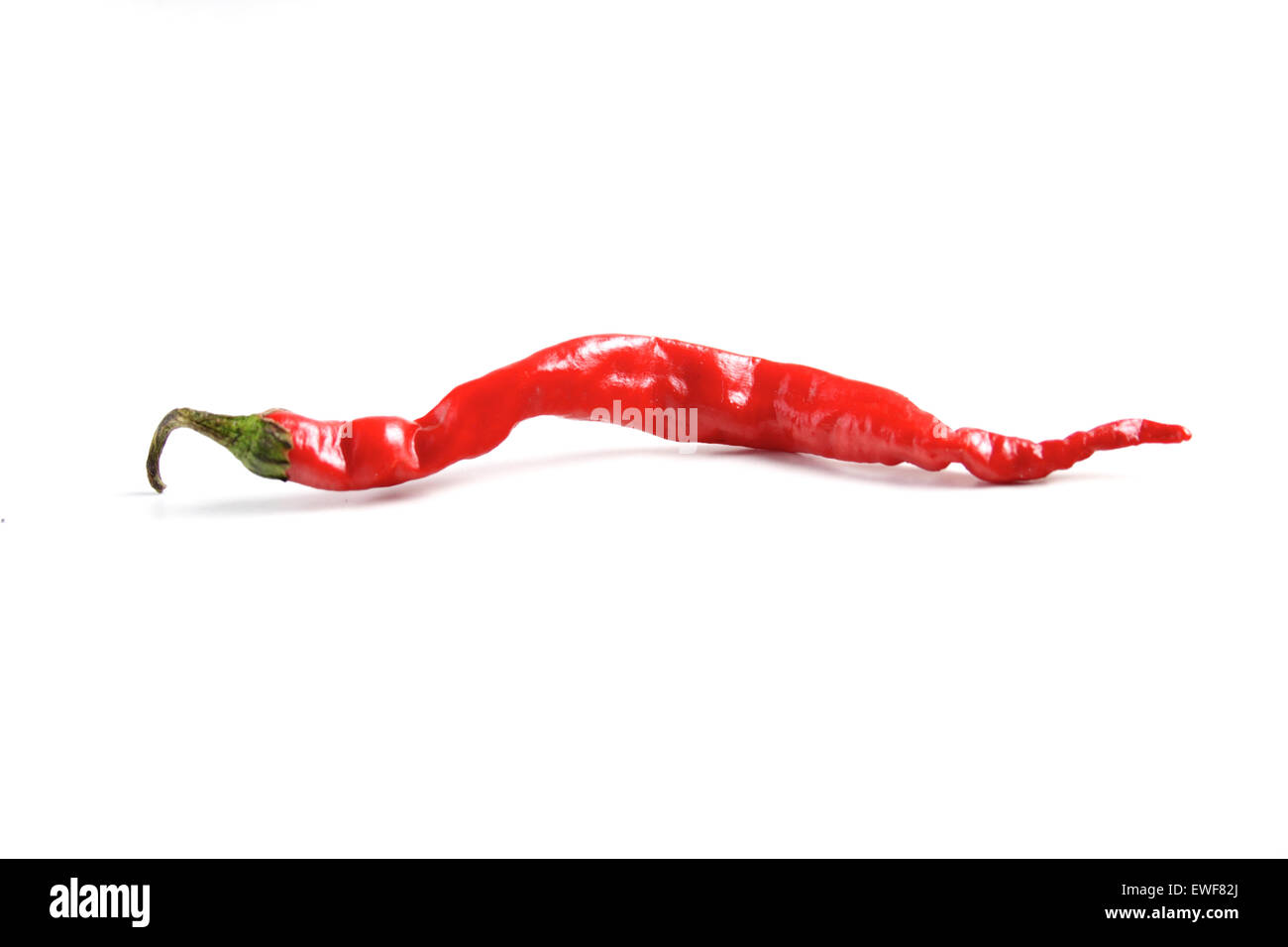 Chilli peppers on white background Stock Photo - Alamy