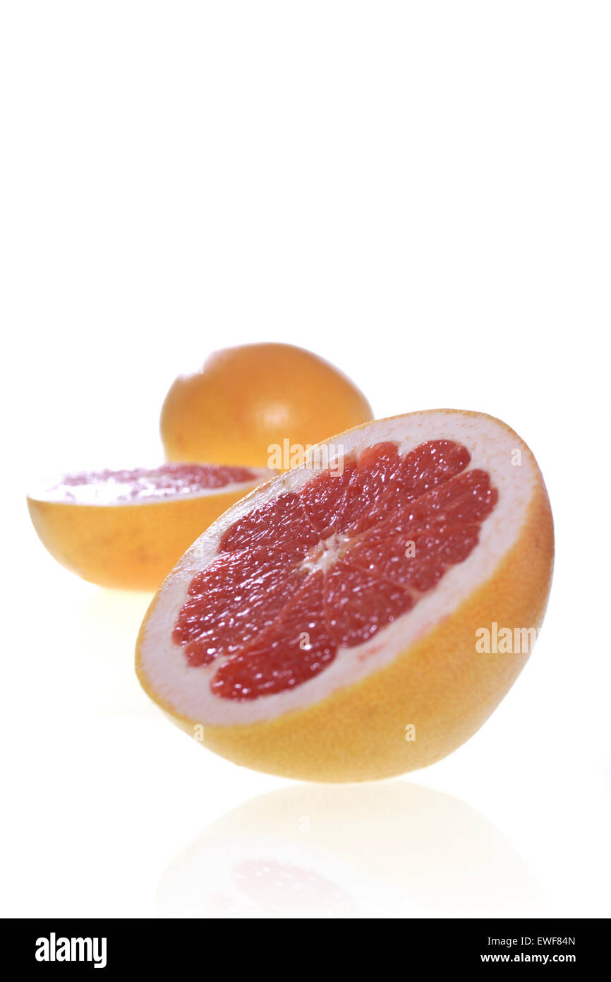 Whole and cut pink grapefruits hi-res stock photography and images - Alamy