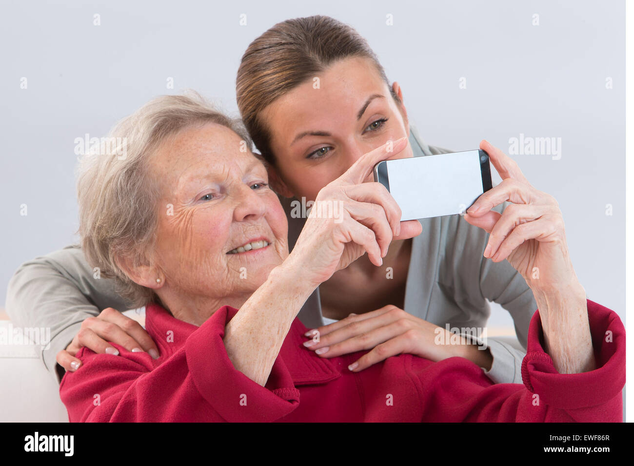 ELDERLY PERSON WITH PHONE Stock Photo - Alamy