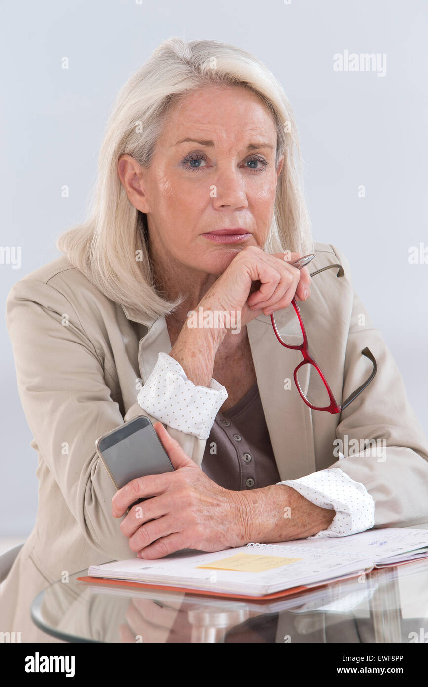 Elderly female worker office hi-res stock photography and images - Alamy