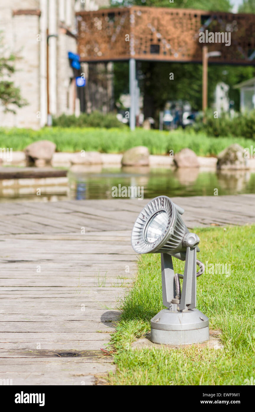 A ground spotlight in the park Stock Photo - Alamy