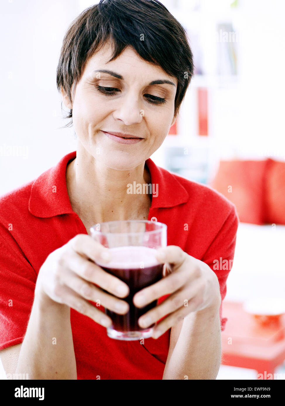 WOMAN WITH COLD DRINK Stock Photo - Alamy