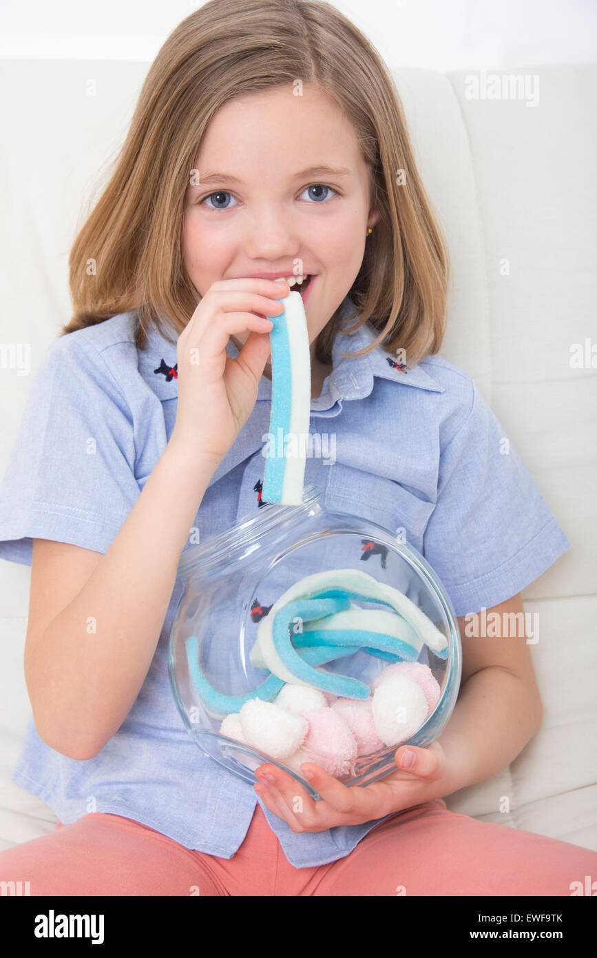 5 year old girl with sweets hi-res stock photography and images - Alamy