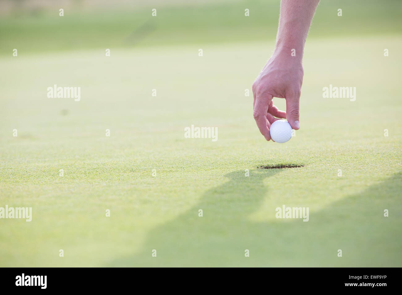 Hand holding ball hi-res stock photography and images - Alamy