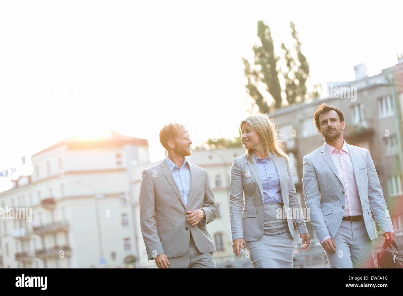 Woman walking on sunny day hi-res stock photography and images - Alamy