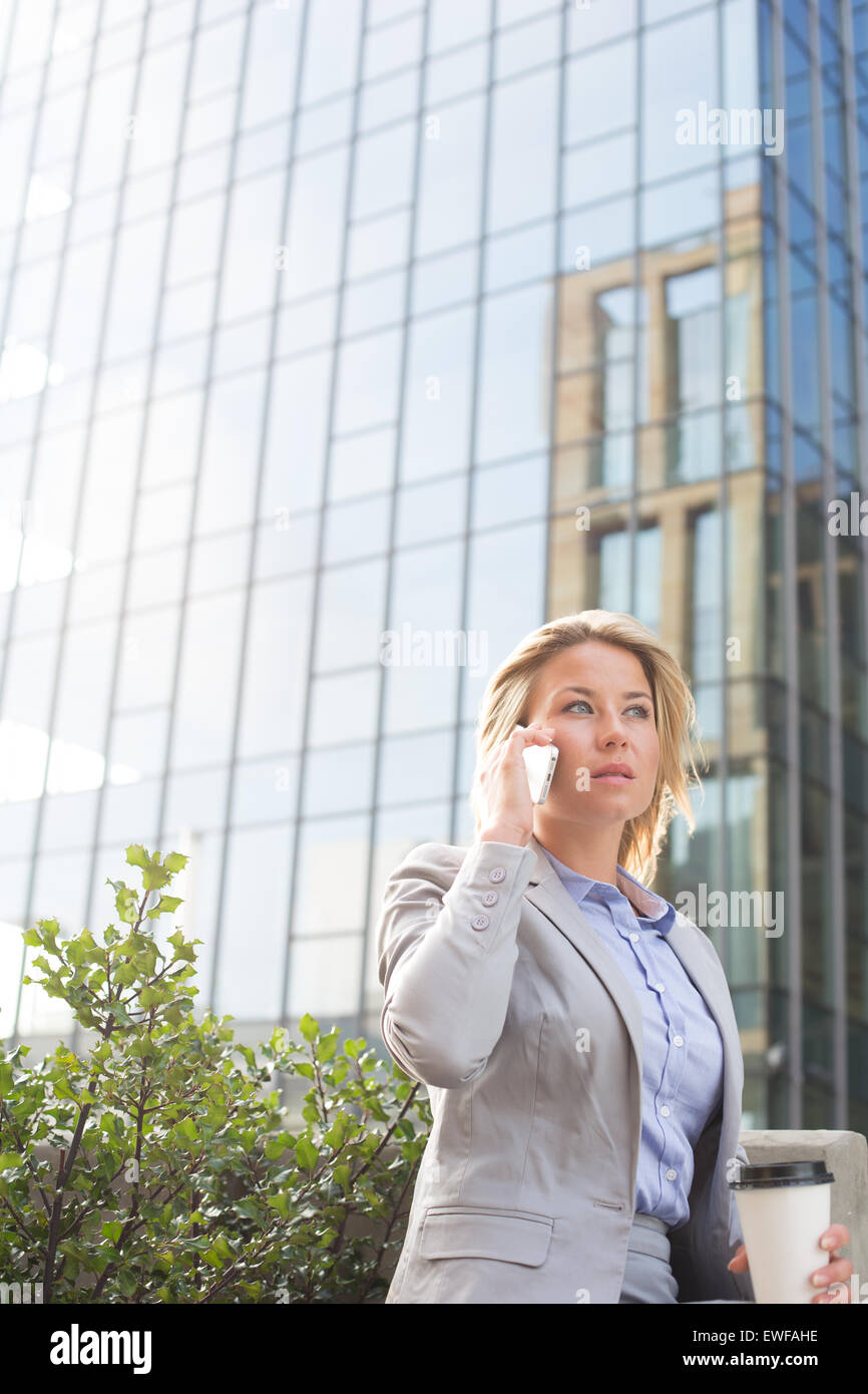 Person holding mobile phone outside hi-res stock photography and images ...