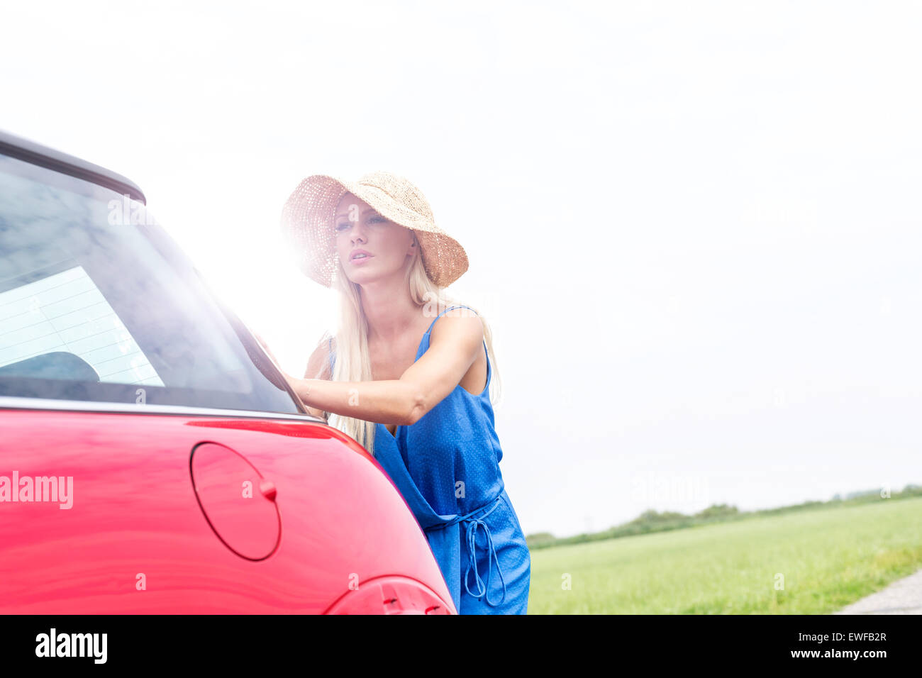 Pushing automobile hi-res stock photography and images - Alamy