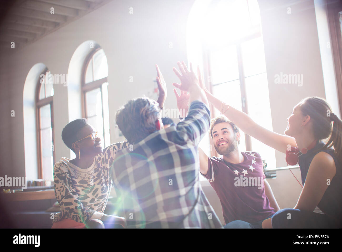 People raising hands hi-res stock photography and images - Alamy