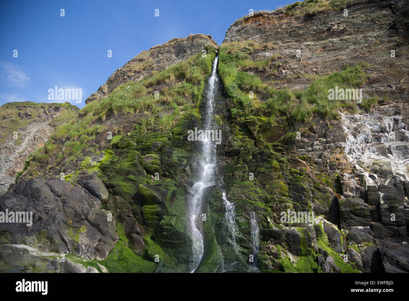 Coastal waterfall at the beach, Tresaith on the mid Wales coast Stock ...