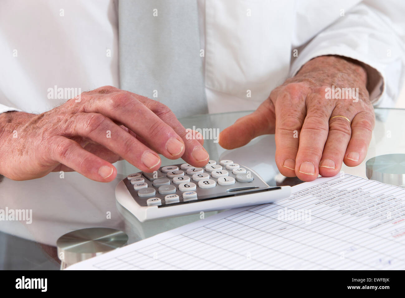 SENIOR DOING PAPERWORK Stock Photo - Alamy