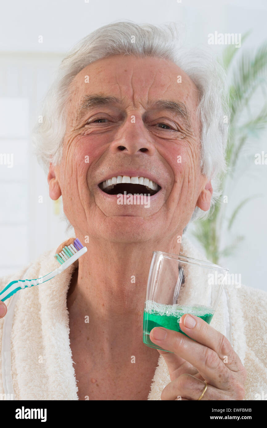 Senior man brushing teeth hi-res stock photography and images - Alamy