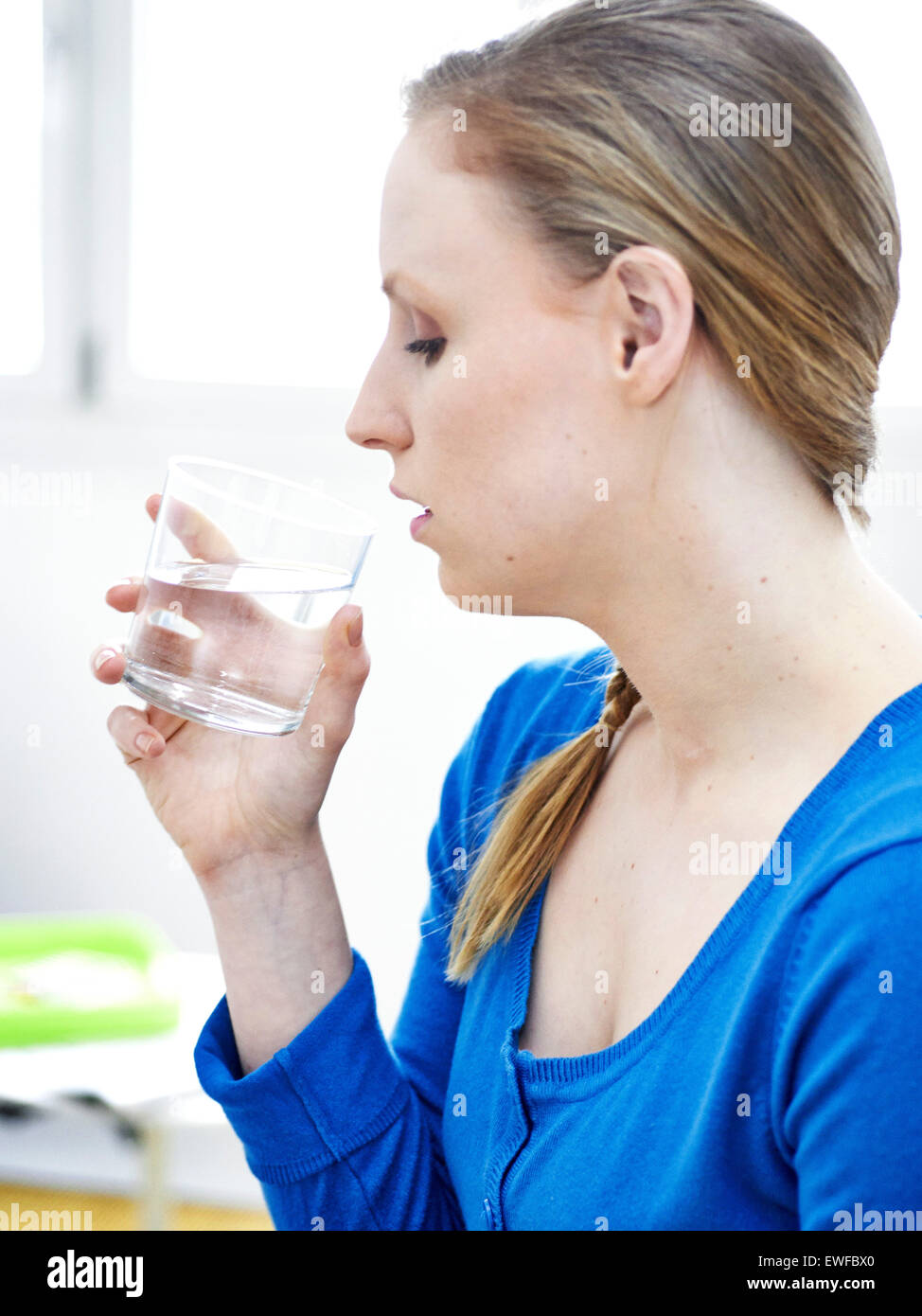 WOMAN WITH COLD DRINK Stock Photo - Alamy