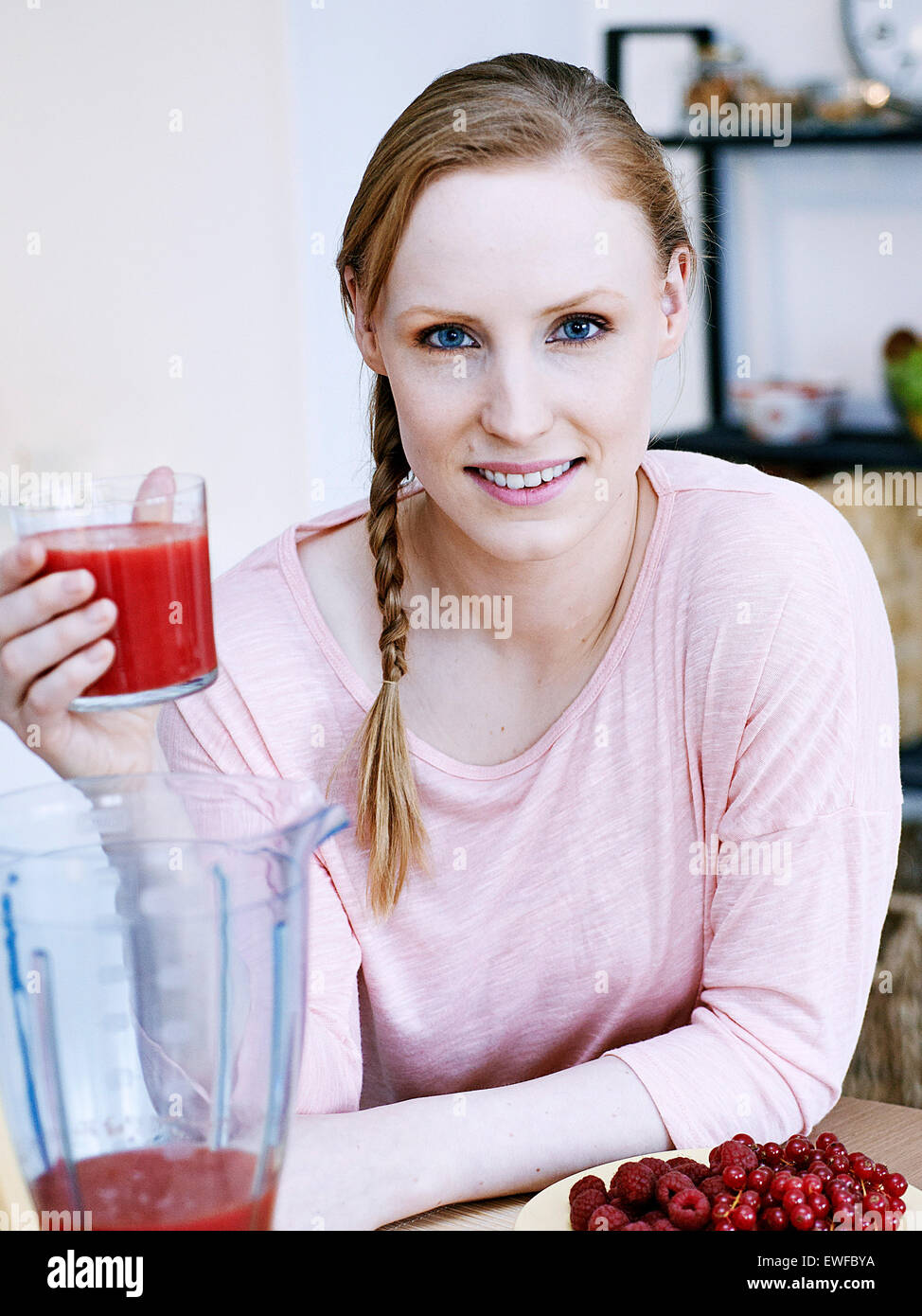 WOMAN WITH COLD DRINK Stock Photo - Alamy