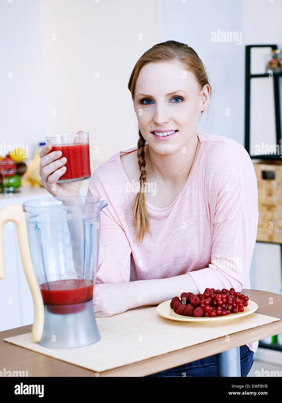 WOMAN WITH COLD DRINK Stock Photo - Alamy
