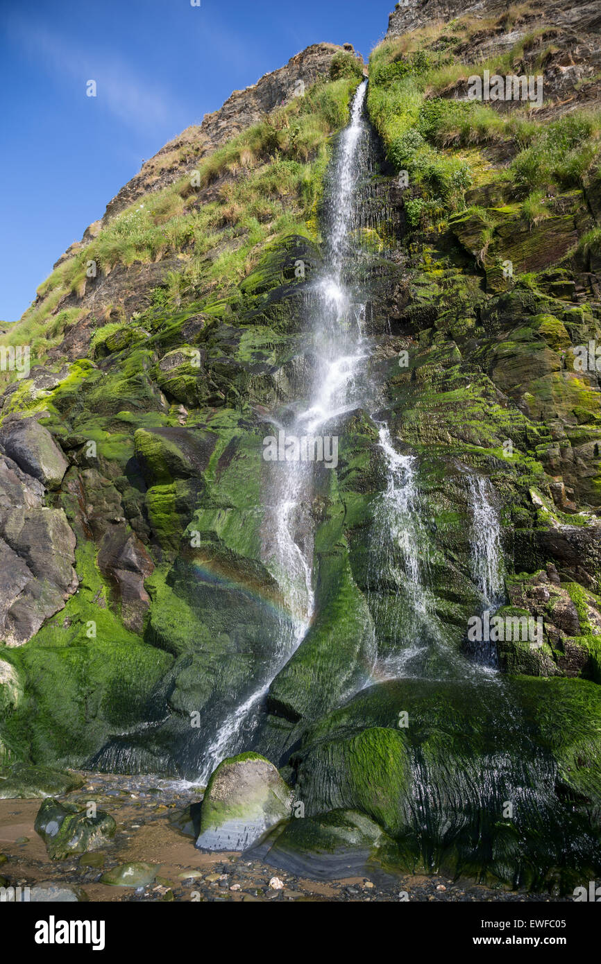 Coastal waterfall at the beach, Tresaith on the mid Wales coast Stock ...