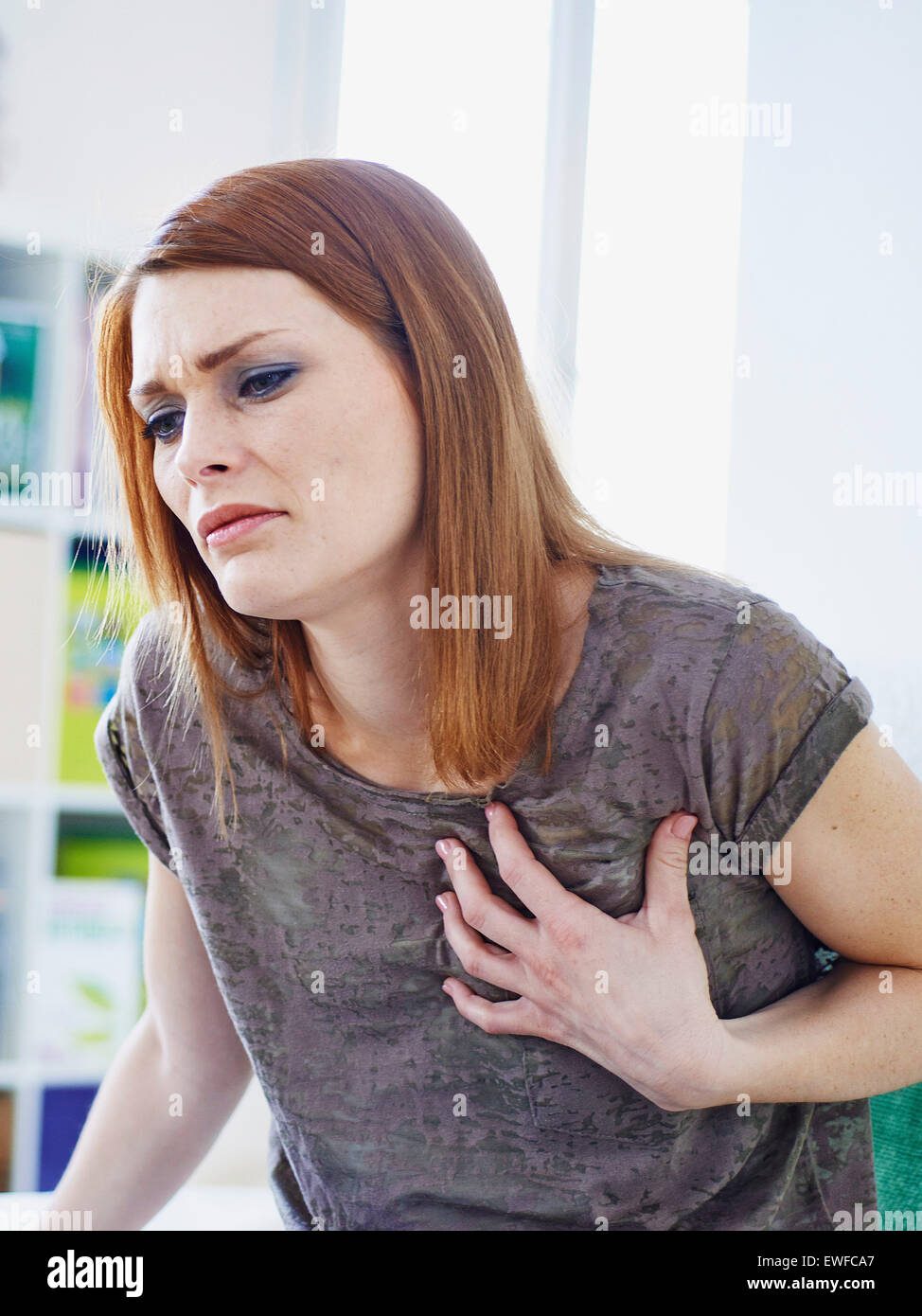 ANGINA PECTORIS IN A WOMAN Stock Photo - Alamy