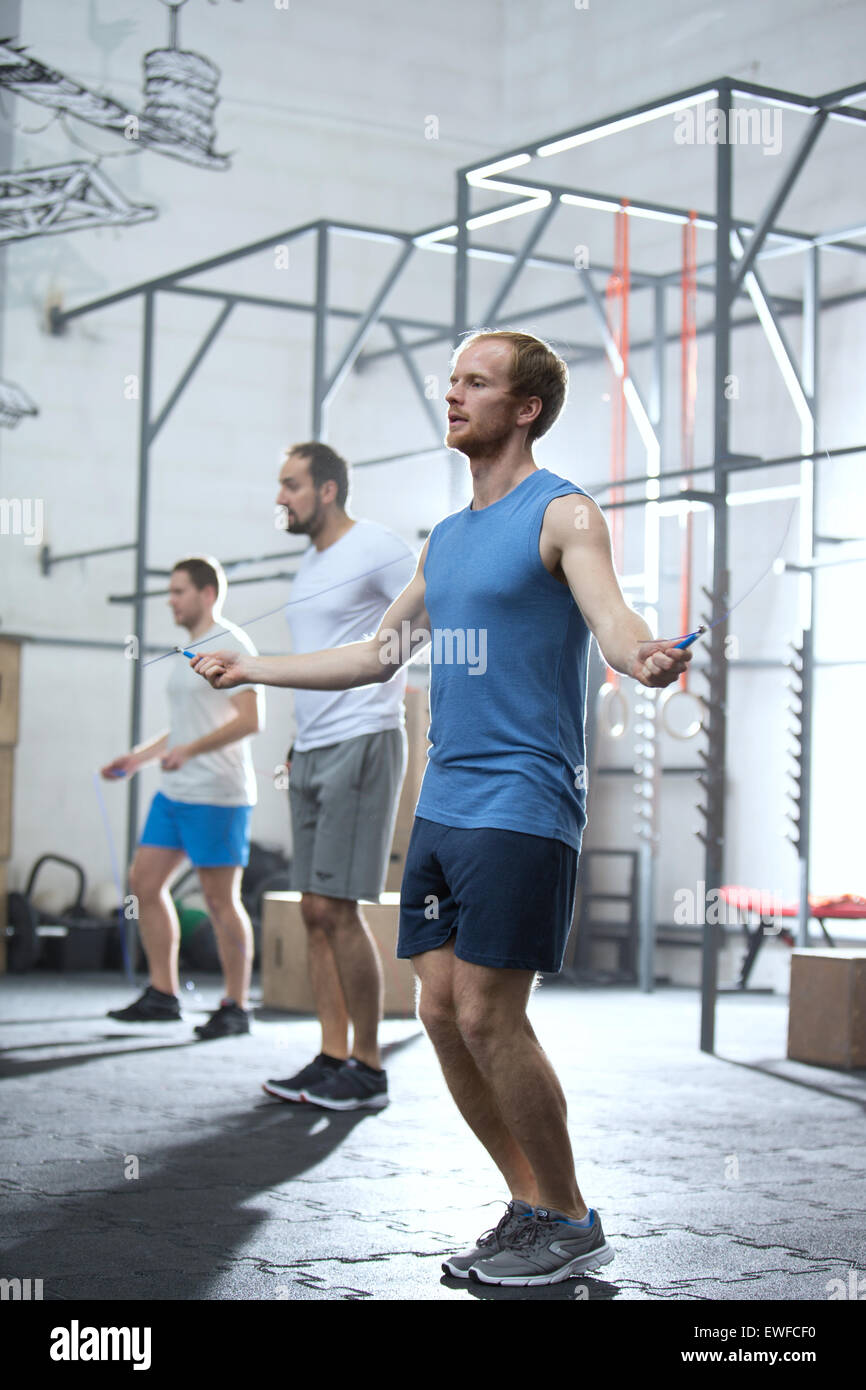 Three men in gym hi-res stock photography and images - Alamy